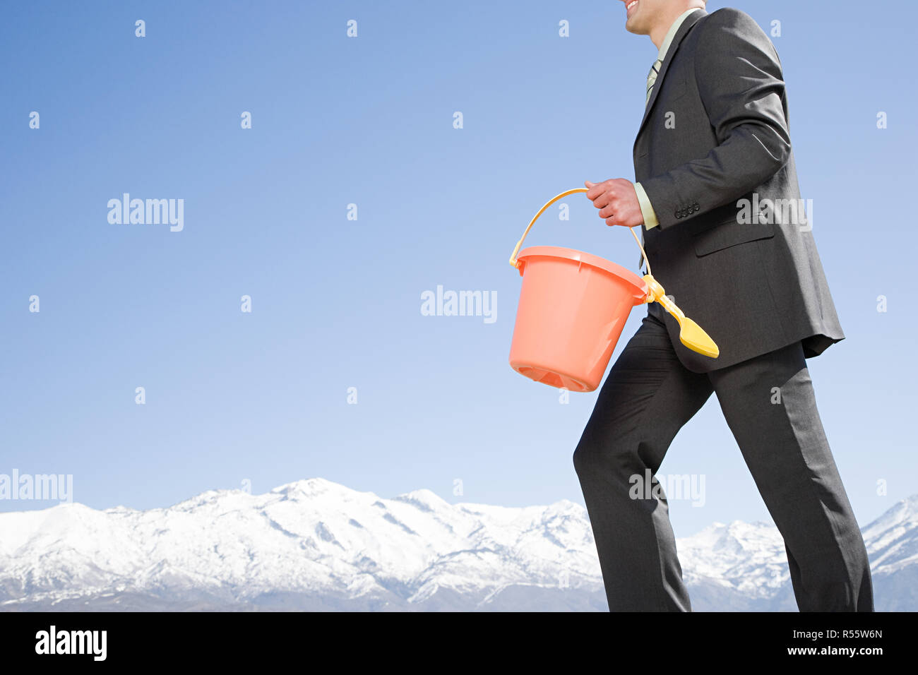 Man carrying bucket desert hi-res stock photography and images - Alamy