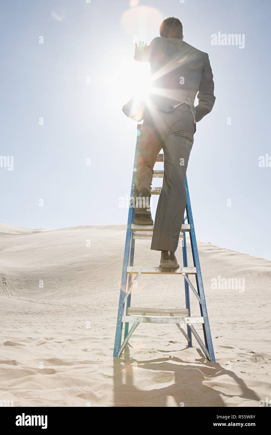 Man ladder desert hi-res stock photography and images - Alamy