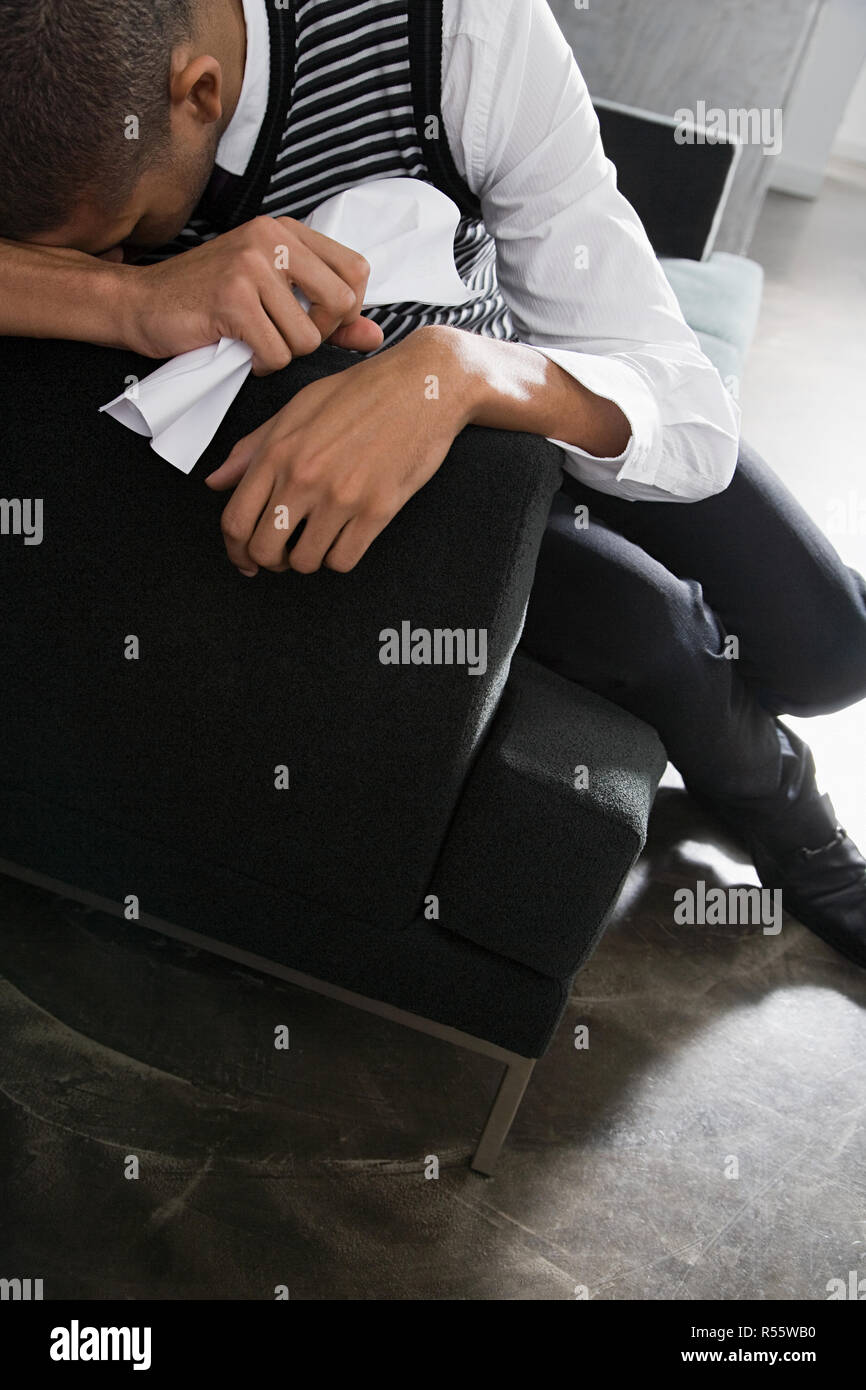 Despairing office worker Stock Photo - Alamy