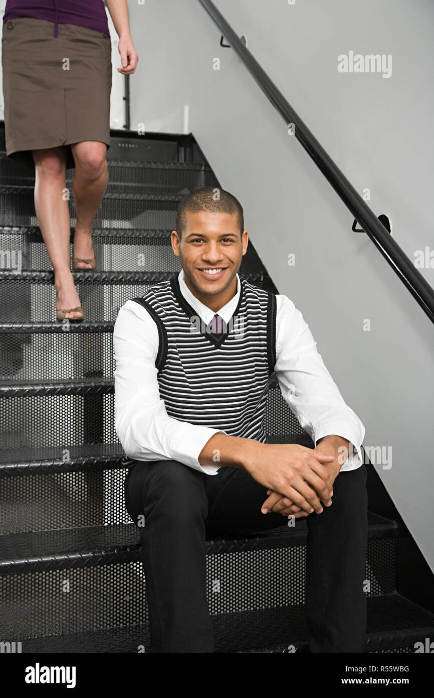 Office worker on stairs Stock Photo - Alamy