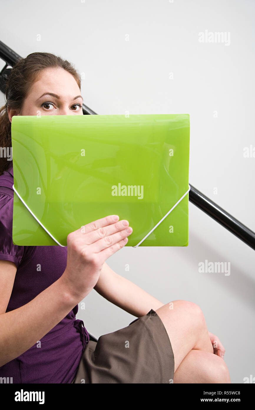 Office worker with file Stock Photo - Alamy
