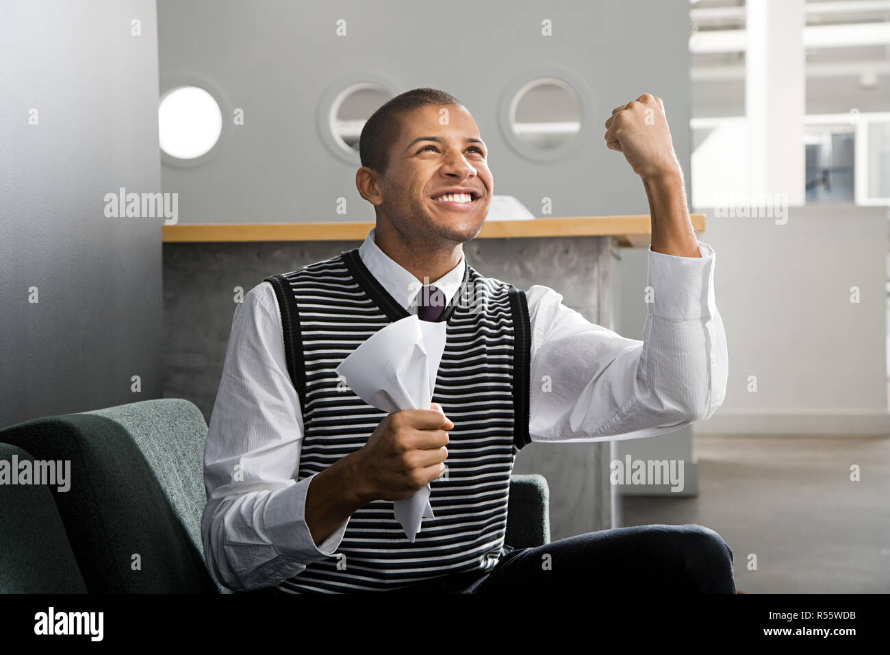 Office worker cheering Stock Photo - Alamy