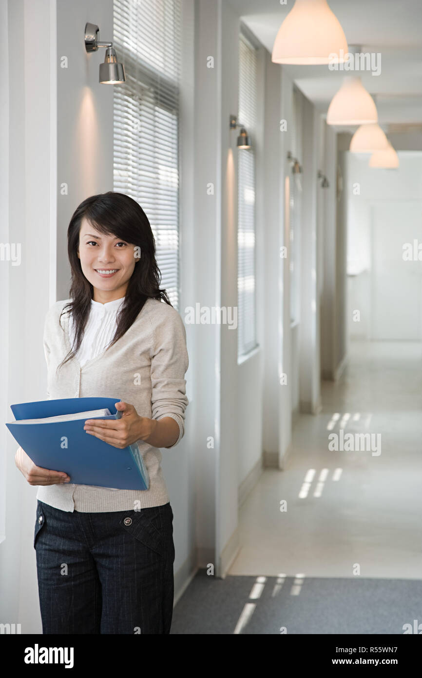 Female office worker Stock Photo - Alamy