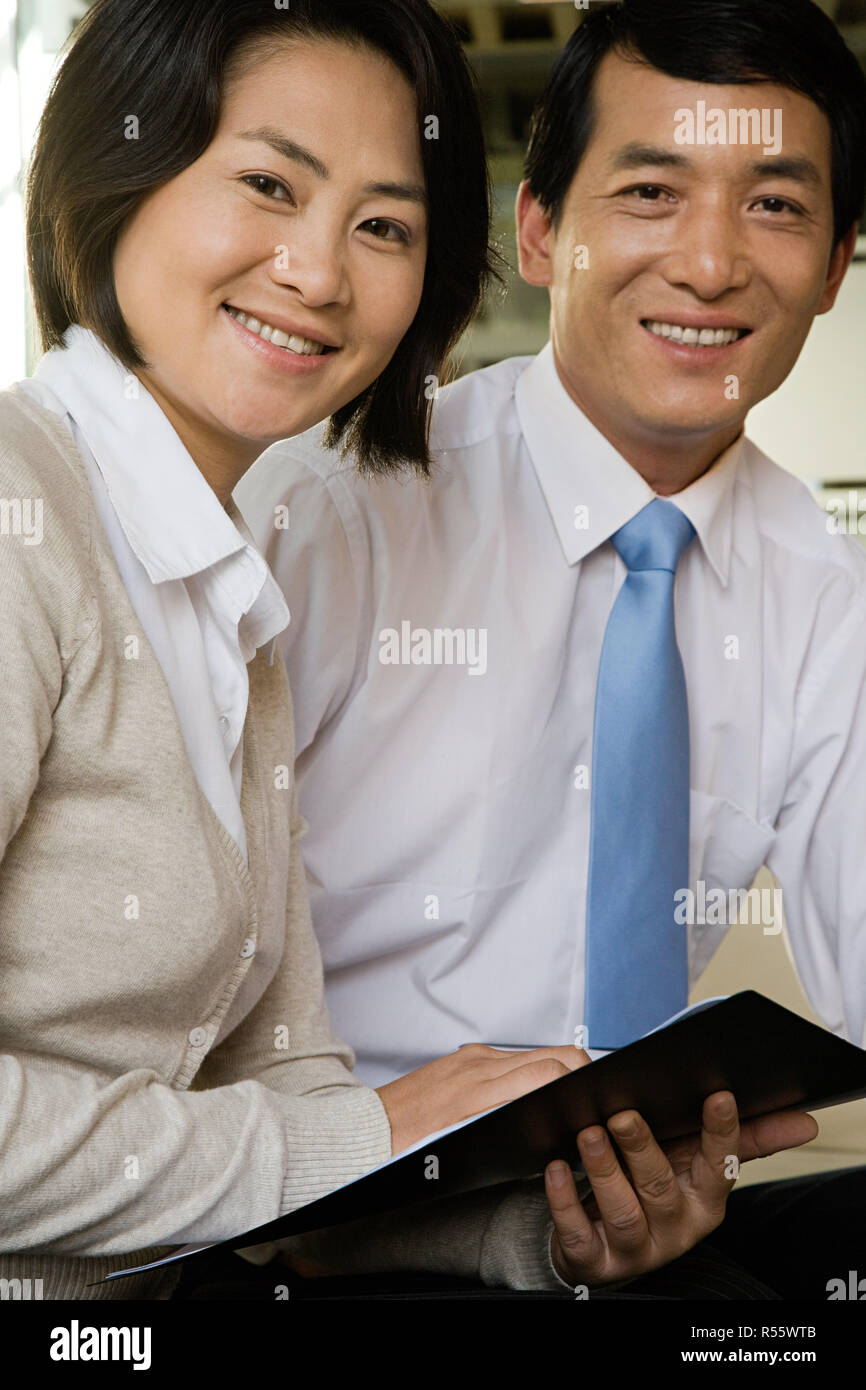 Two Chinese business colleagues Stock Photo - Alamy
