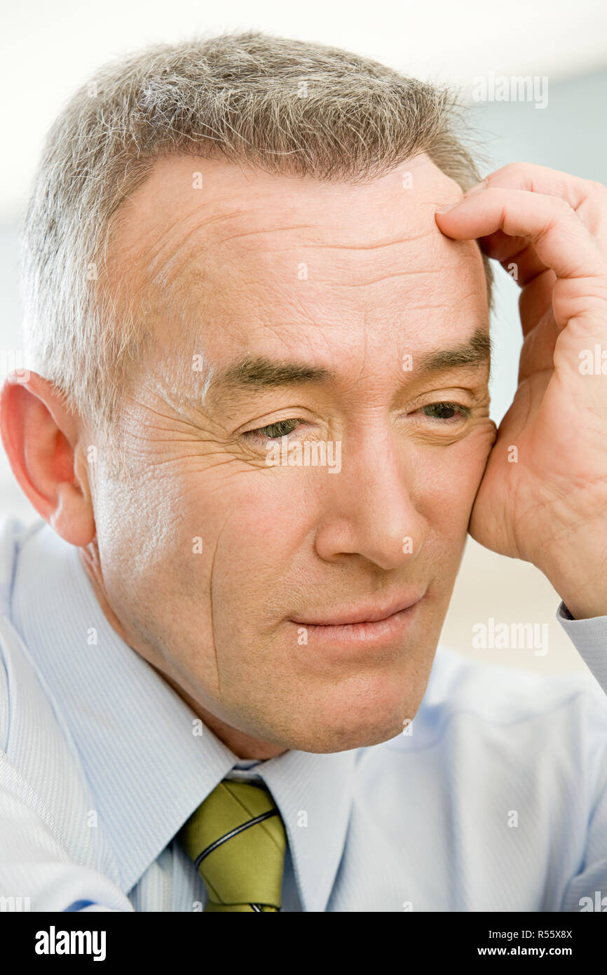 Thoughtful looking businessman Stock Photo - Alamy Thoughtful looking businessman Stock Photo - Alamy