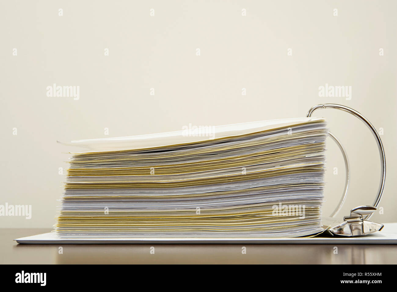 Papers in a ring binder Stock Photo - Alamy
