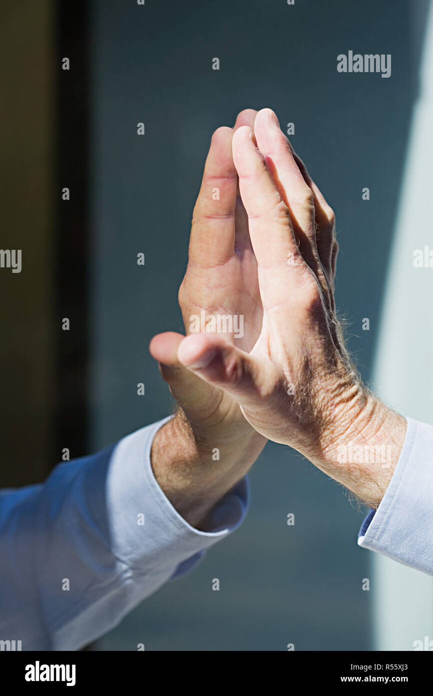 Hand of man and reflection Stock Photo - Alamy