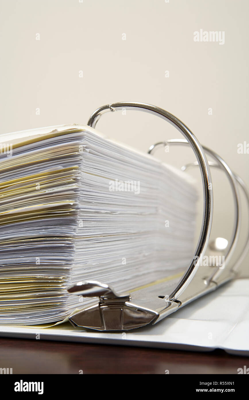 Papers in a ring binder Stock Photo - Alamy