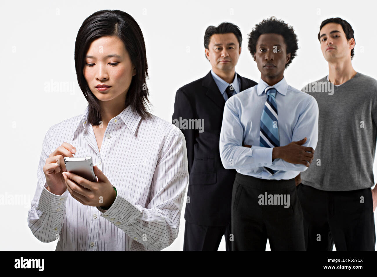 Group of four office workers Stock Photo - Alamy