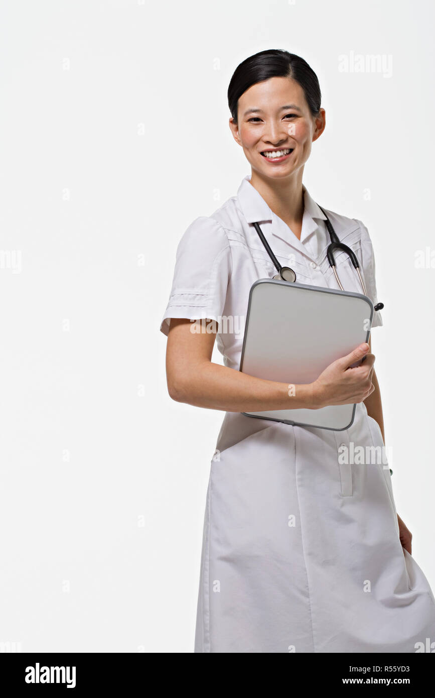 Vertical portrait shot smiling nurse hi-res stock photography and ...