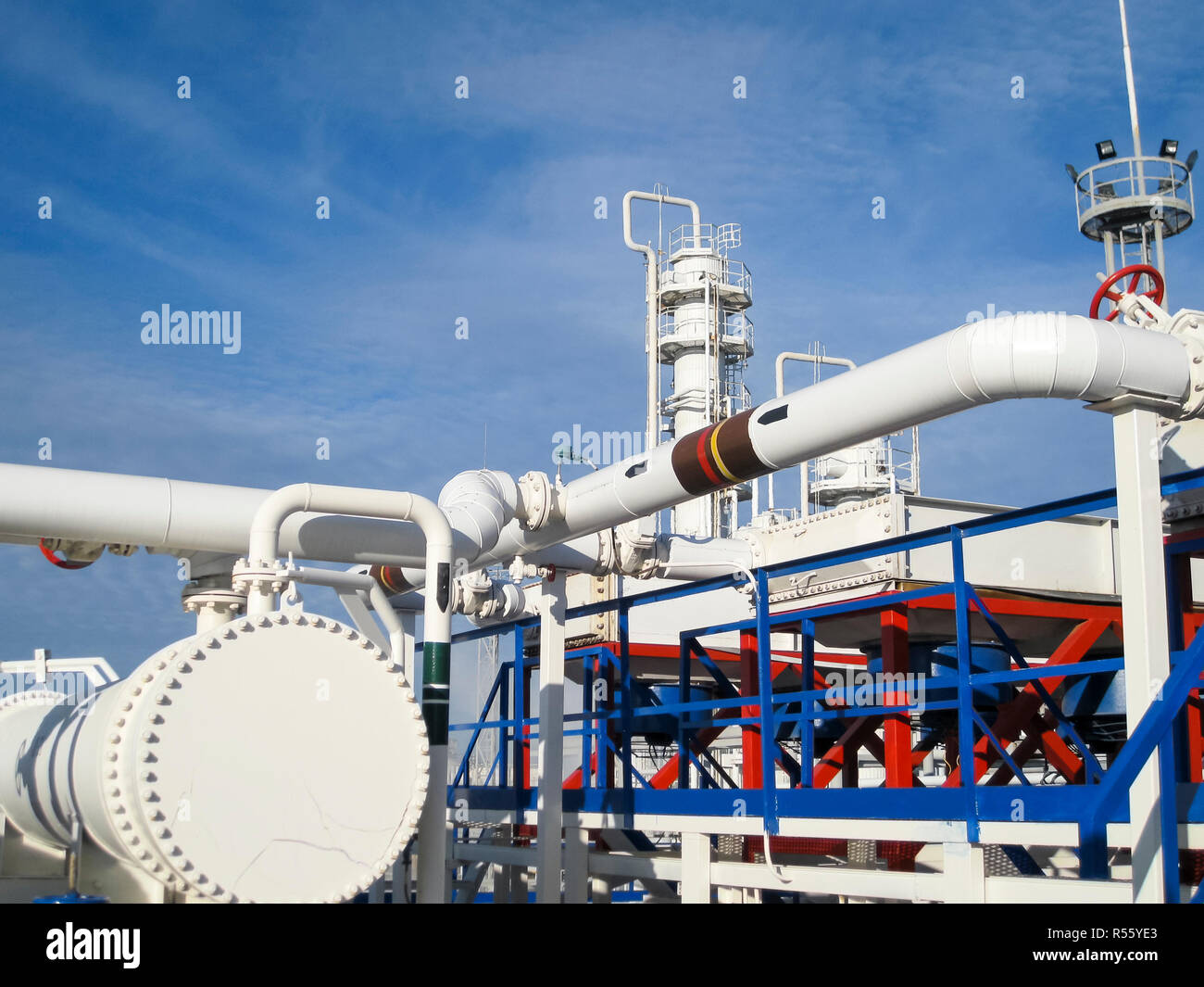 Heat exchangers in a refinery. Heated gasoline air cooler. The ...