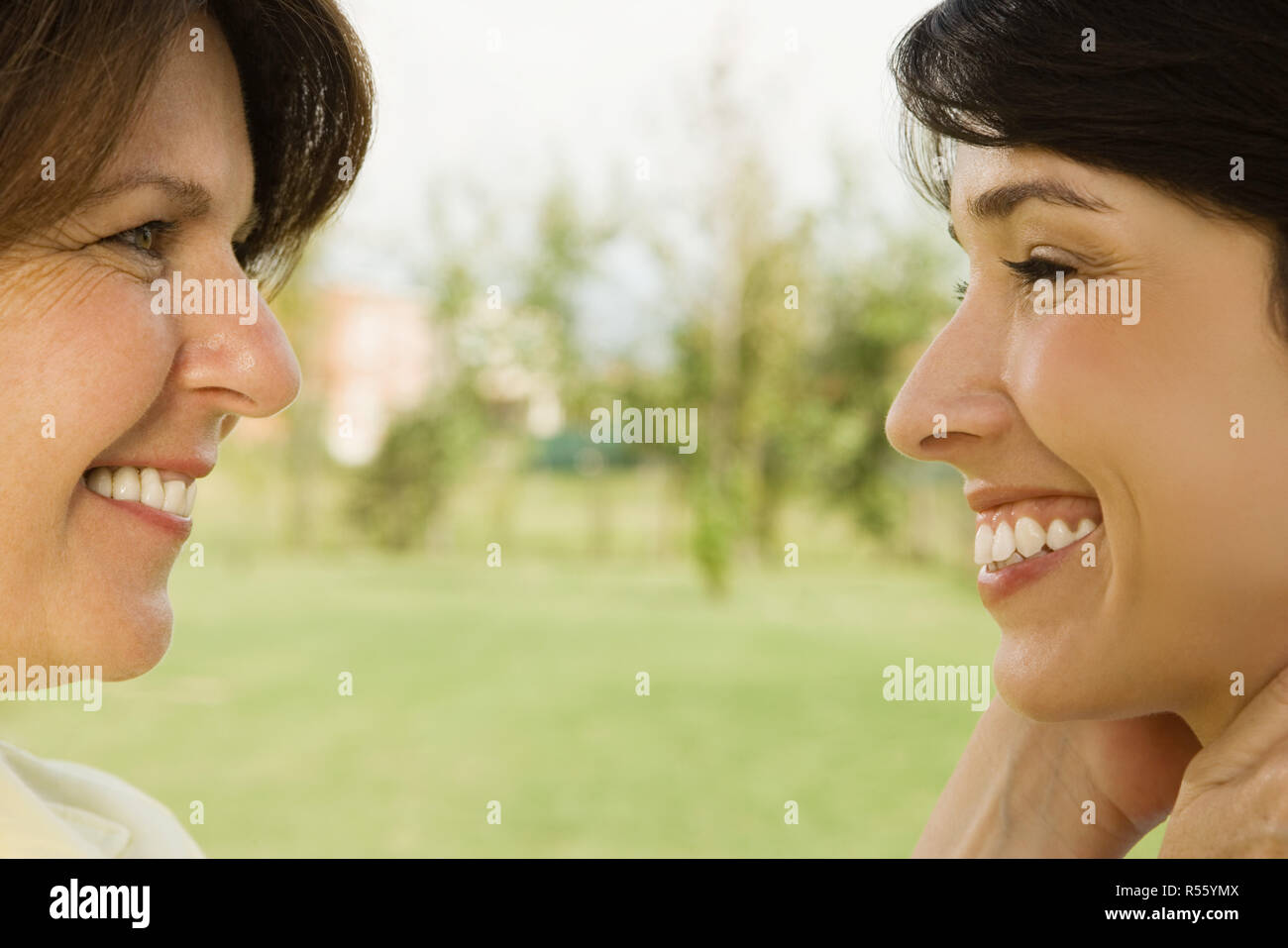 Mother and daughter face to face Stock Photo - Alamy