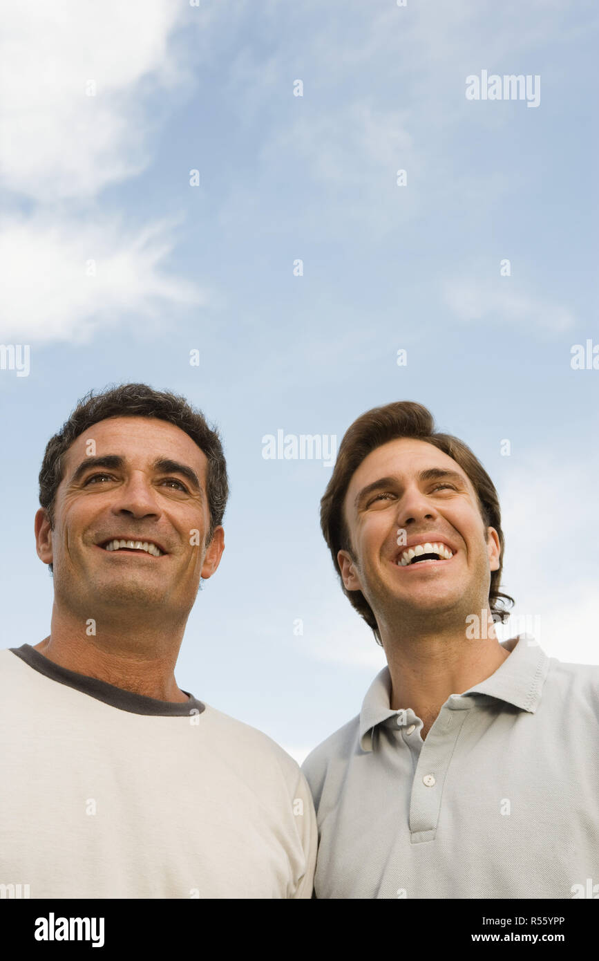 Two men smiling Stock Photo - Alamy