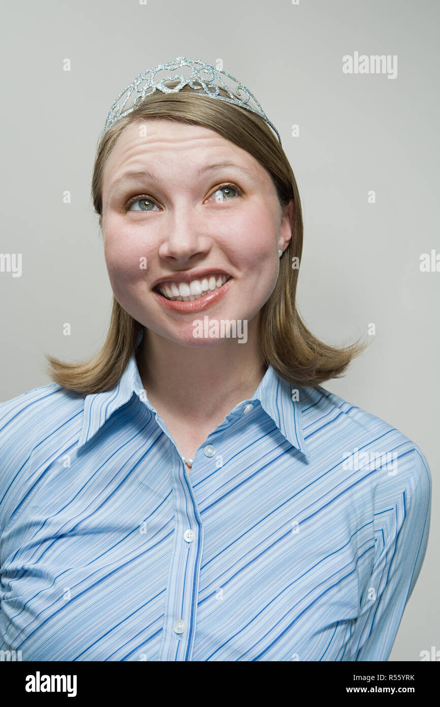 Office worker wearing tiara Stock Photo - Alamy