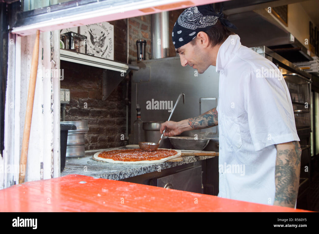 Pizza store owner hi-res stock photography and images - Alamy