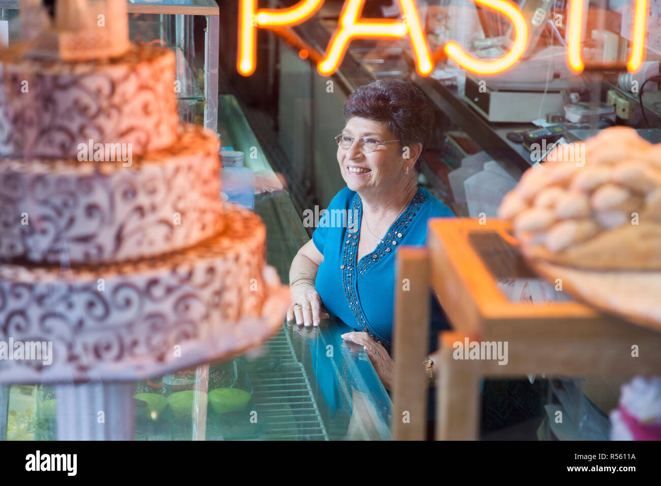 Bakery shop owner Stock Photo - Alamy