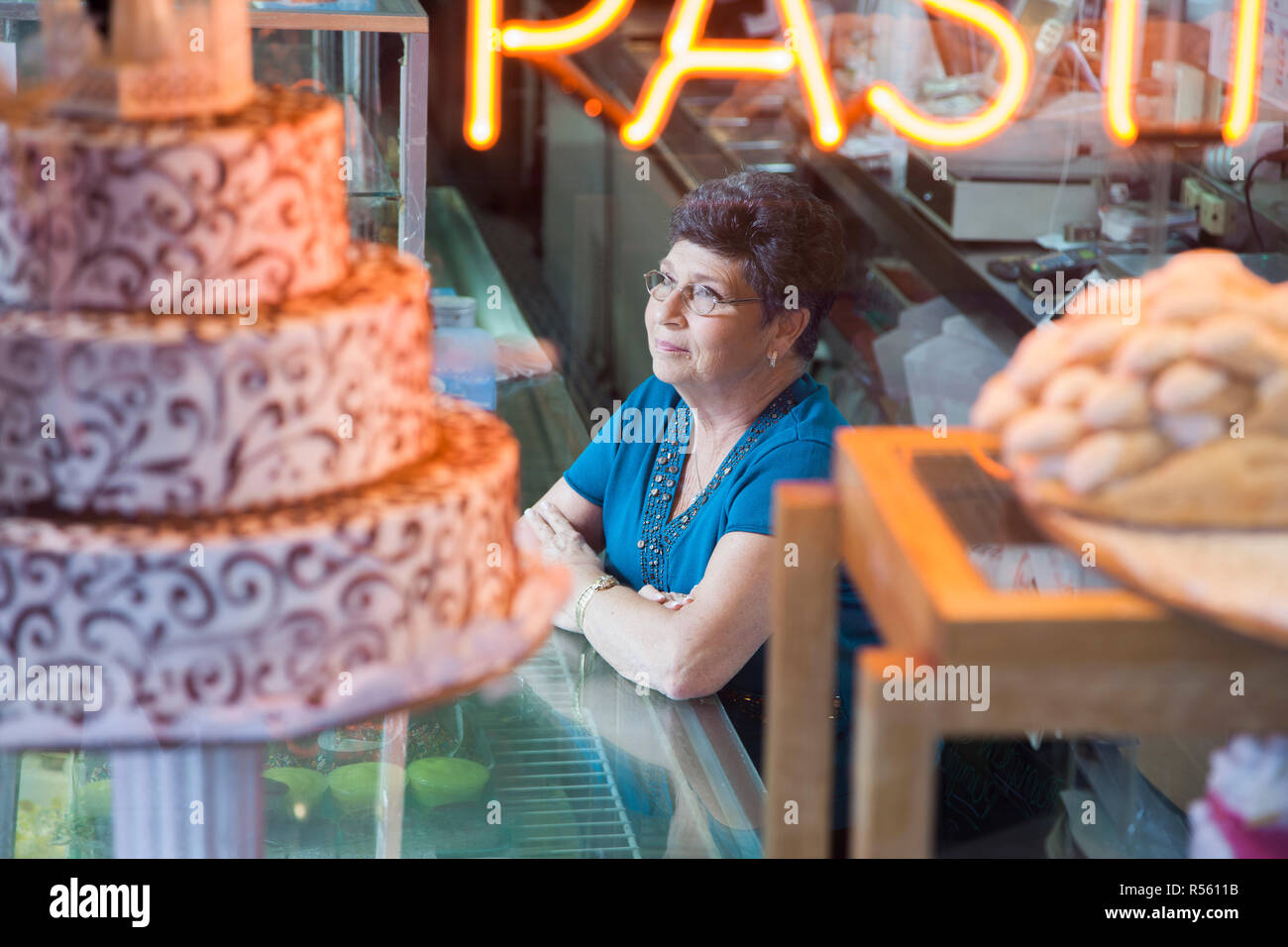 Bakery shop owner Stock Photo - Alamy