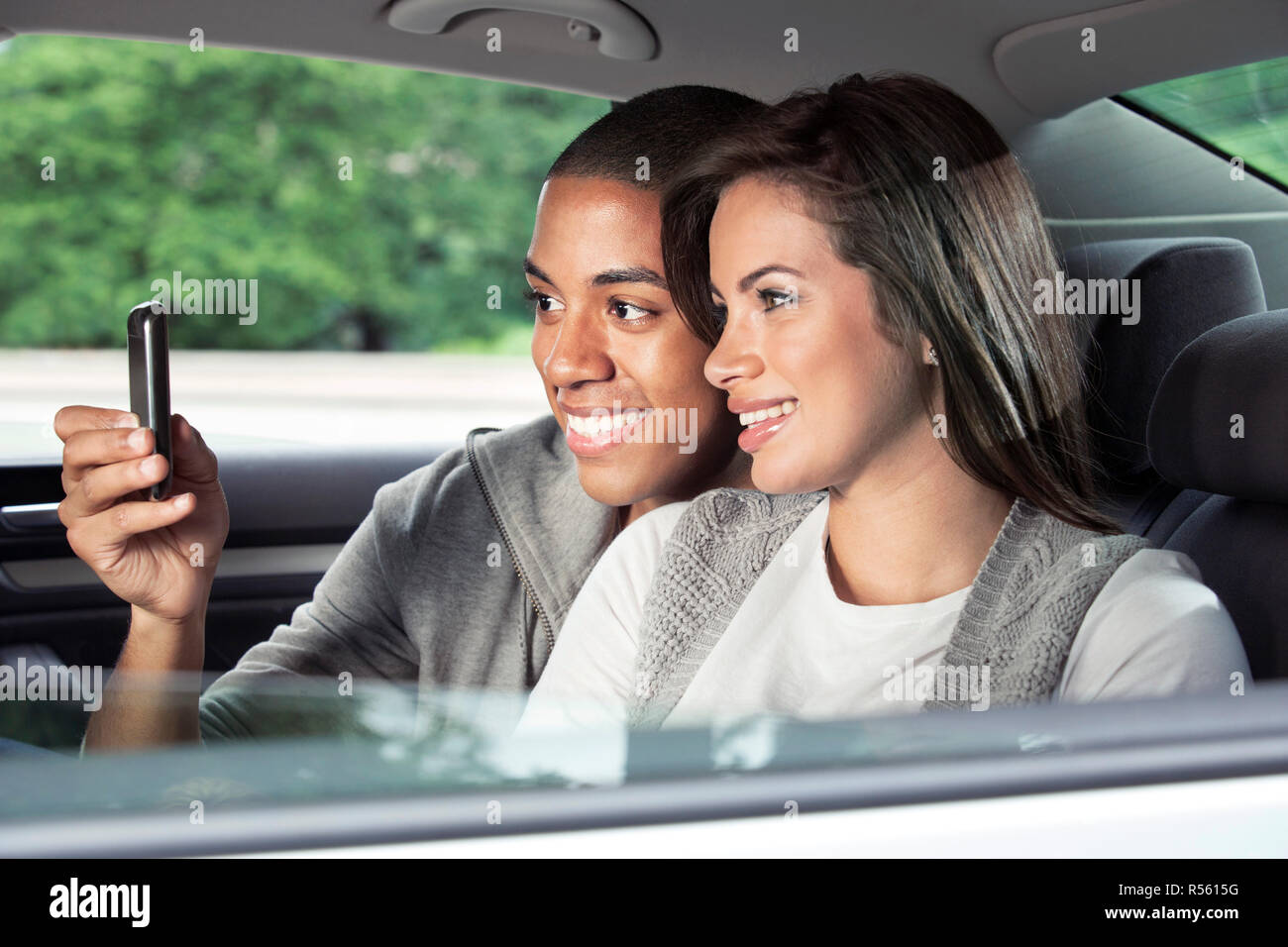 Teenagers with car Stock Photo - Alamy