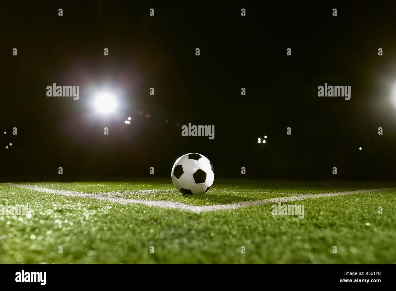 Soccer ball on sports field Stock Photo - Alamy
