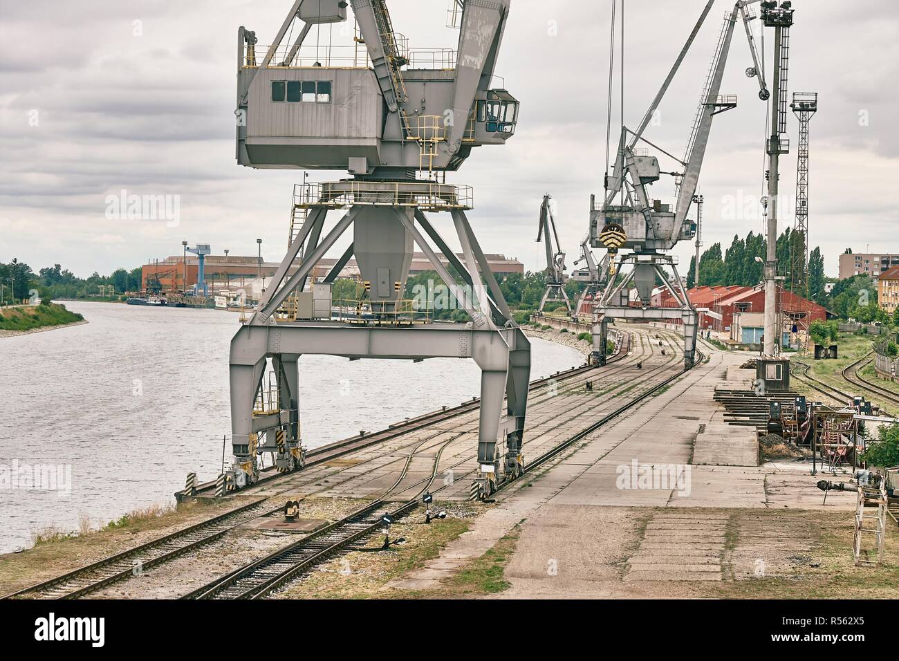 Dock with cranes Stock Photo - Alamy