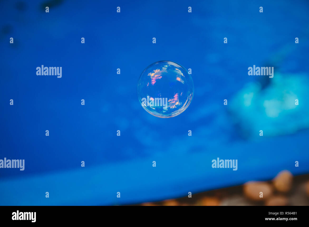Soap bubbles fly in the swimming pool Stock Photo - Alamy