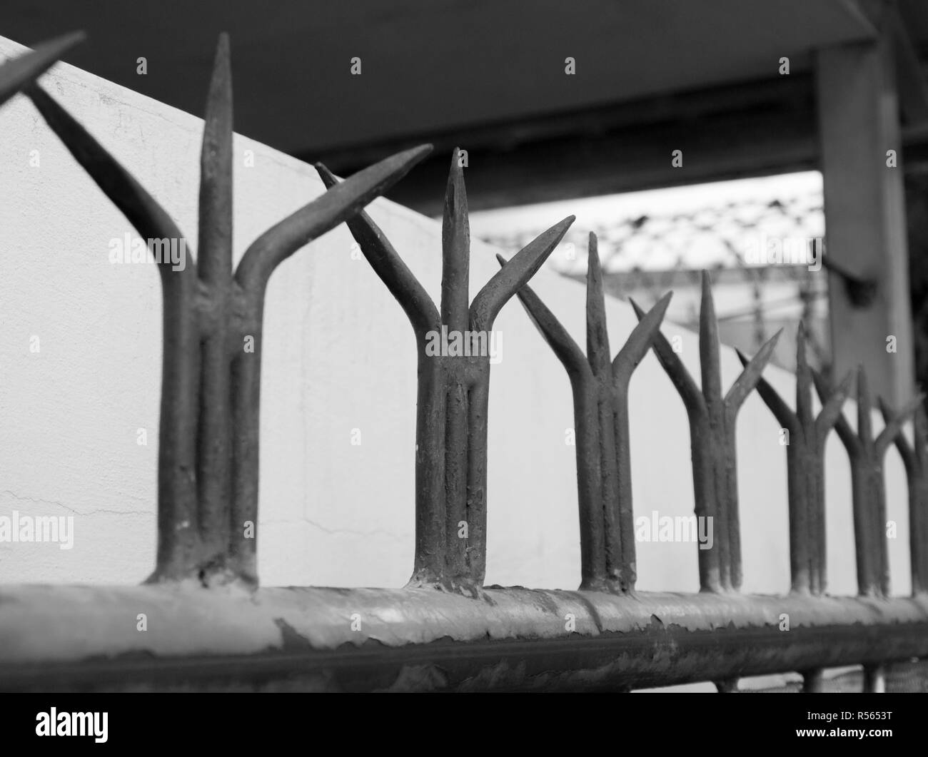 RUSTIC RED WROUGHT IRON FENCE Stock Photo - Alamy