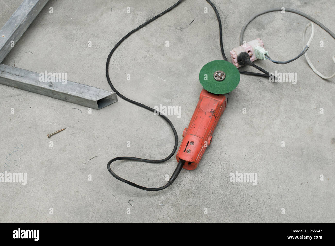 PLUGGED ELECTRIC GREEN WHEEL GRINDER Stock Photo - Alamy