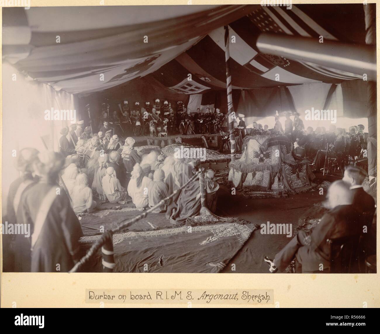 Durbar on board RIMS Argonaut, Shergah [Sharjah?]. Curzon and his staff ...