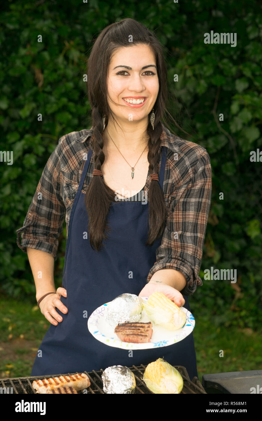 Pretty Woman Smiling Cooking Steaks Barbecue Backyard Food Grill Stock ...