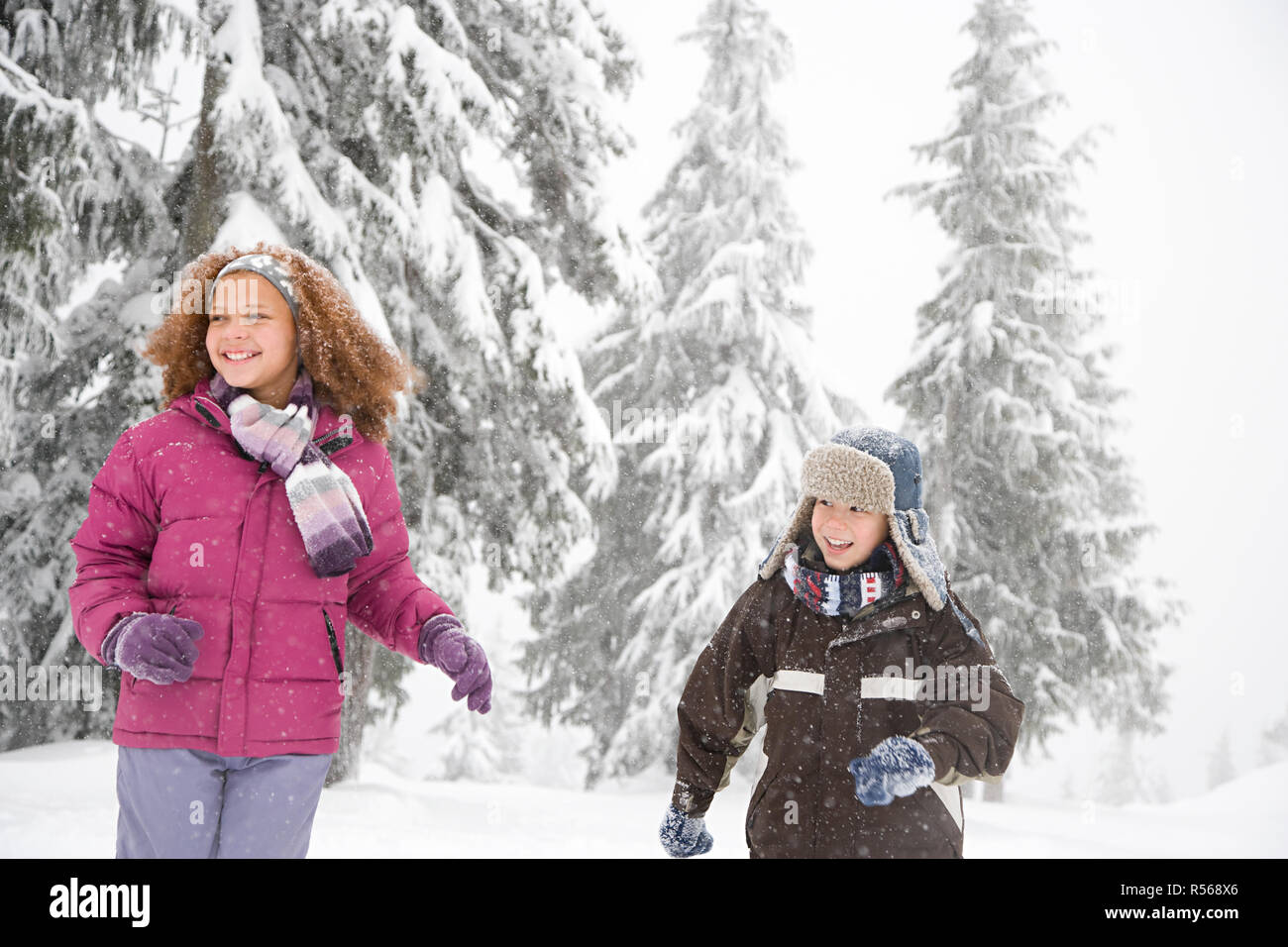 Children in the snow Stock Photo - Alamy