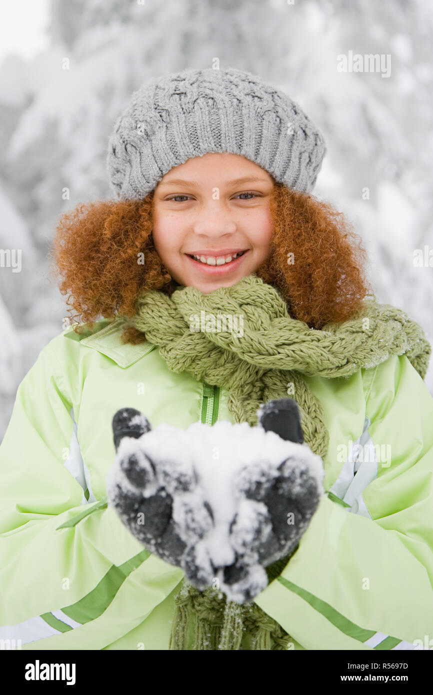 Girl with snow Stock Photo - Alamy