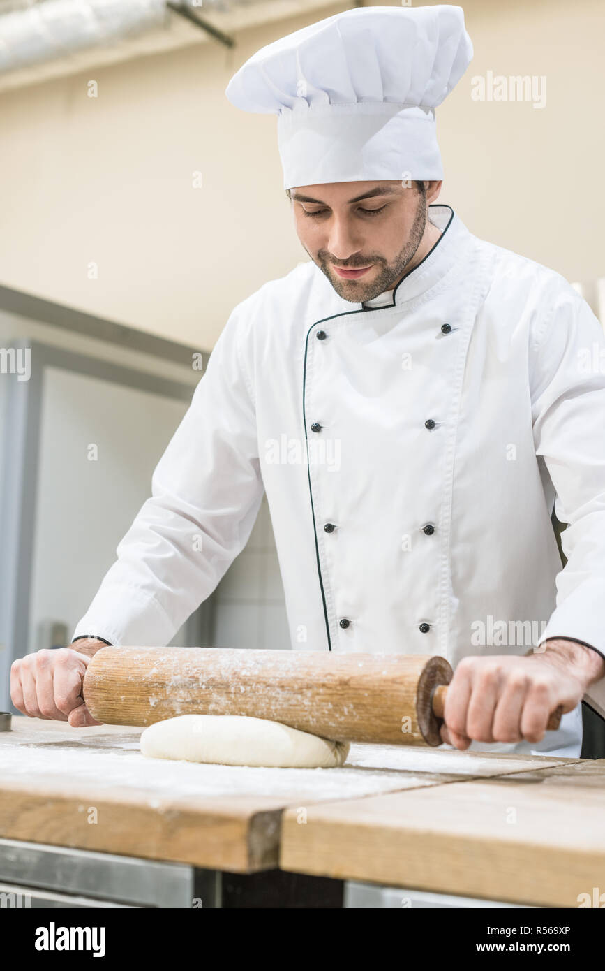 Handsome baker in uniform hi-res stock photography and images - Alamy