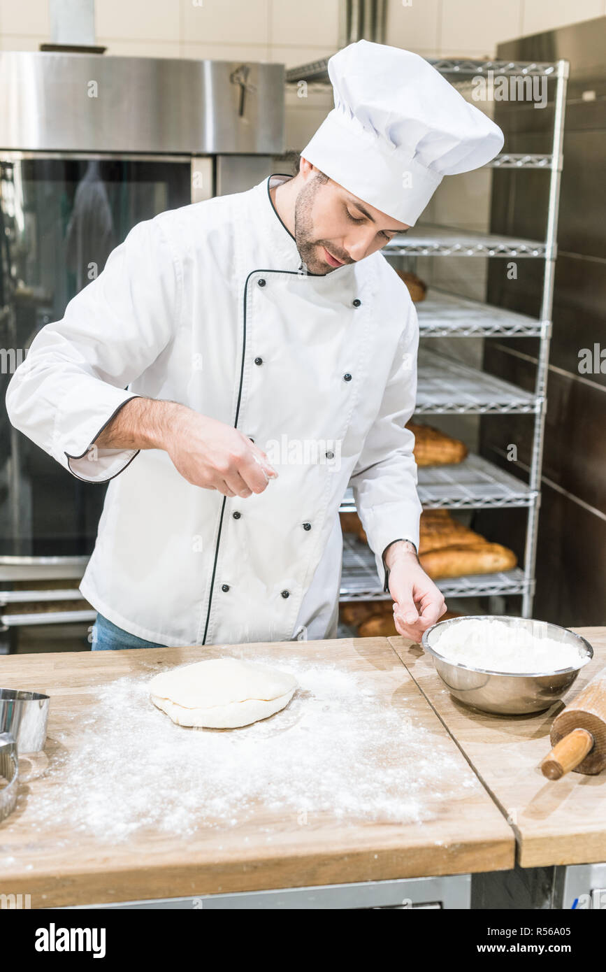 Handsome baker in uniform hi-res stock photography and images - Alamy