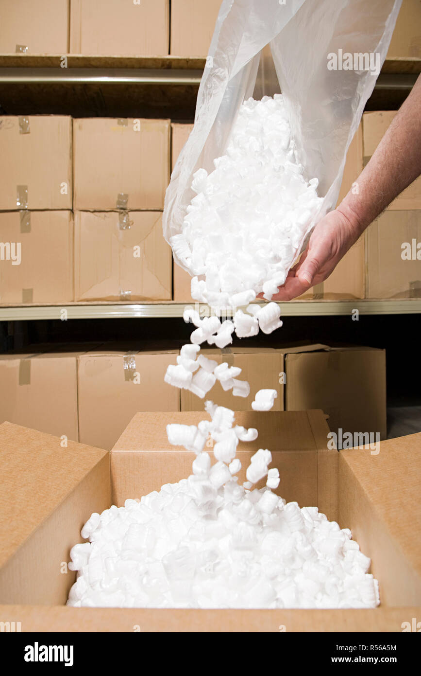 Business person in packaging peanuts hi-res stock photography and ...
