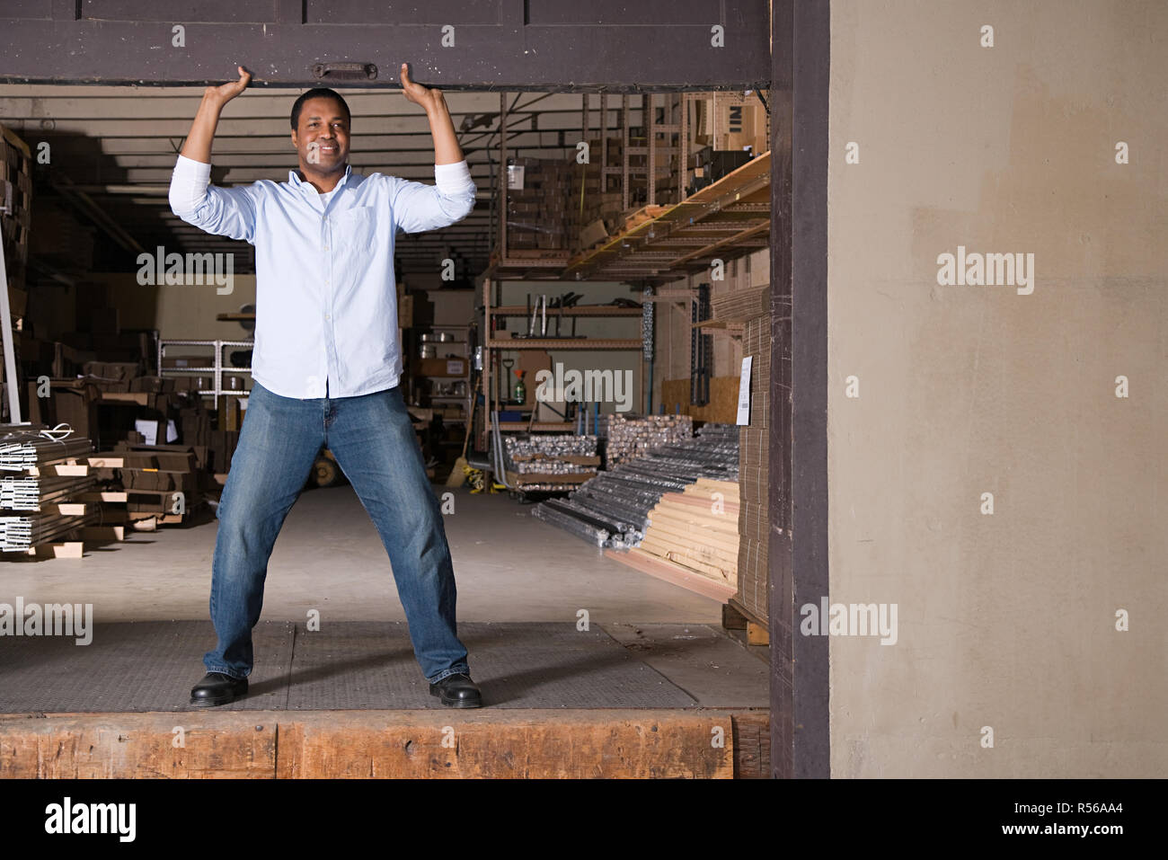 Man at loading bay Stock Photo - Alamy