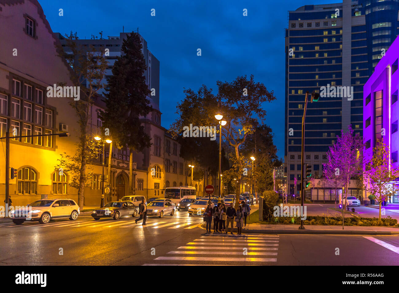 Baku, Azerbaijan - Oct 11th 2018 - Locals and tourists crossing a road ...