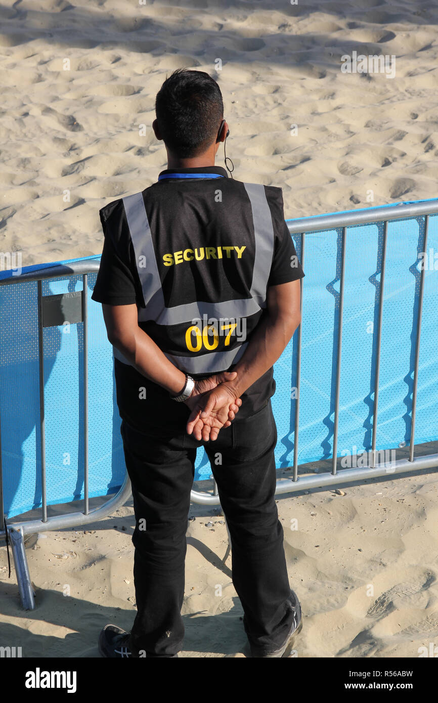 Security guard on crowd control Stock Photo - Alamy