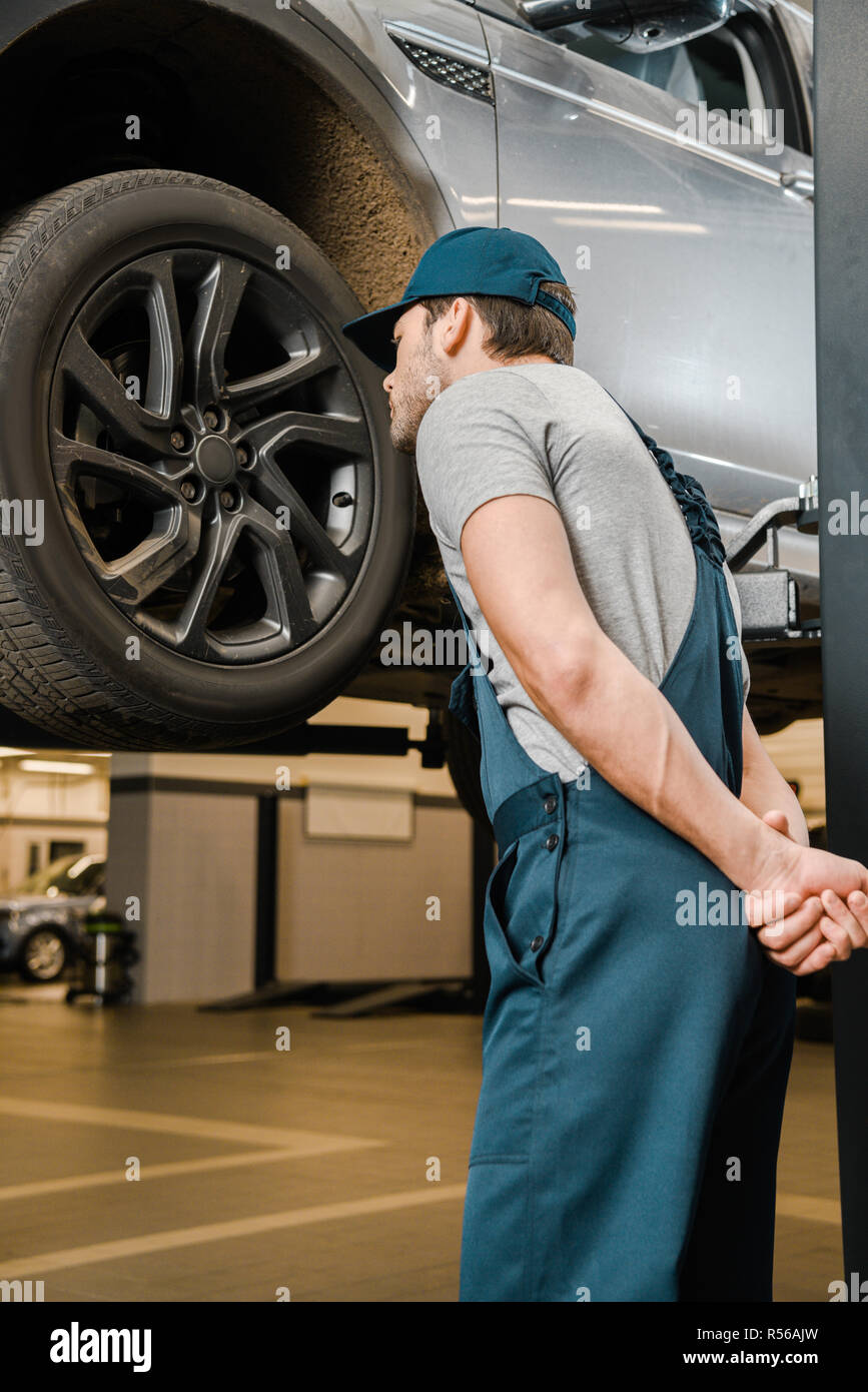 Rear view male auto mechanic hi-res stock photography and images - Alamy