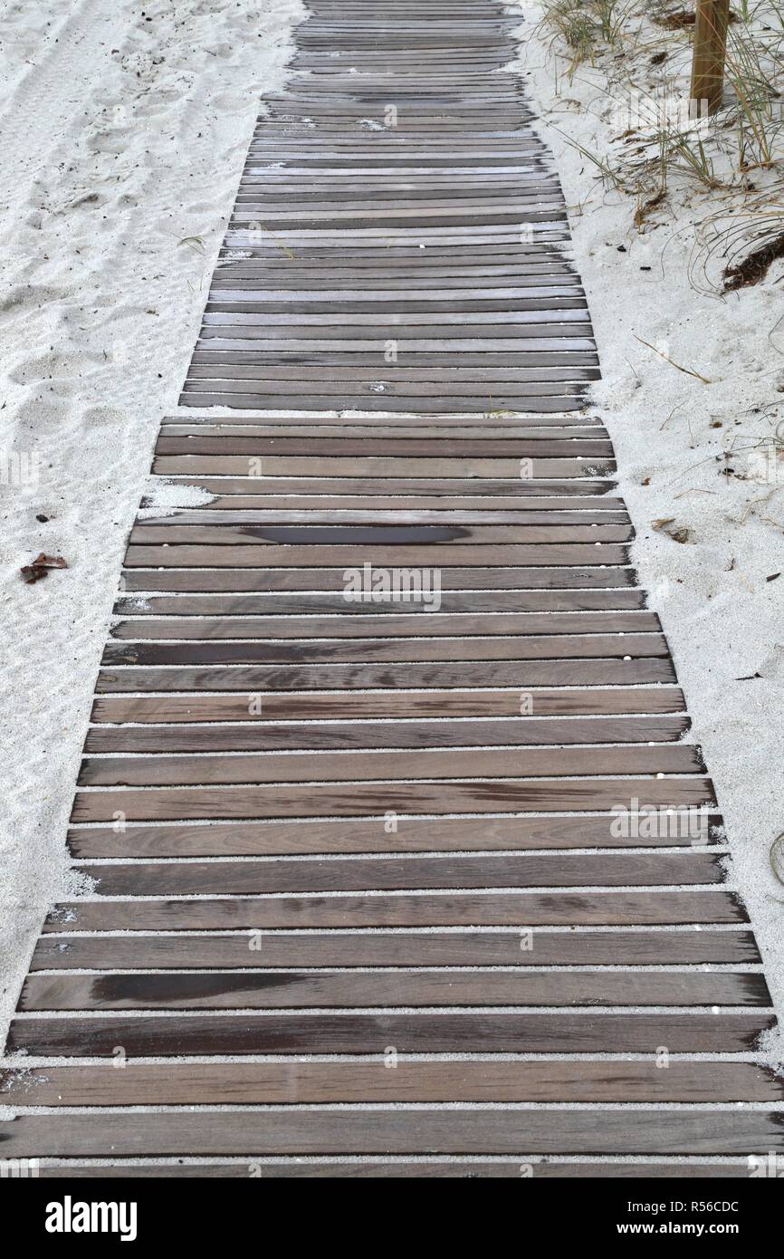 Beach boardwalk in the sand Stock Photo - Alamy