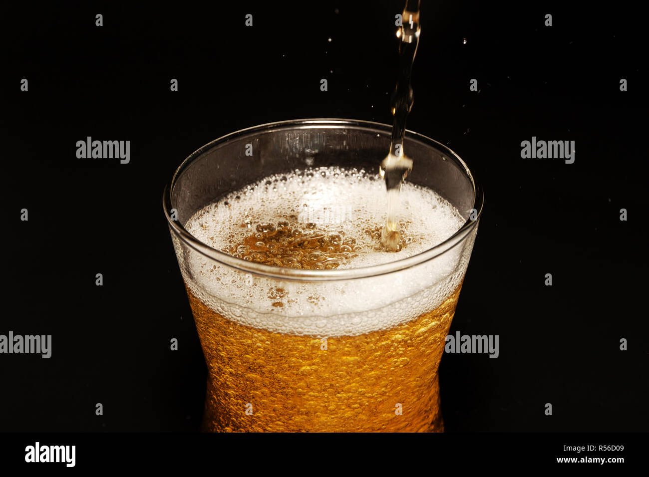 Beer in glass Stock Photo - Alamy