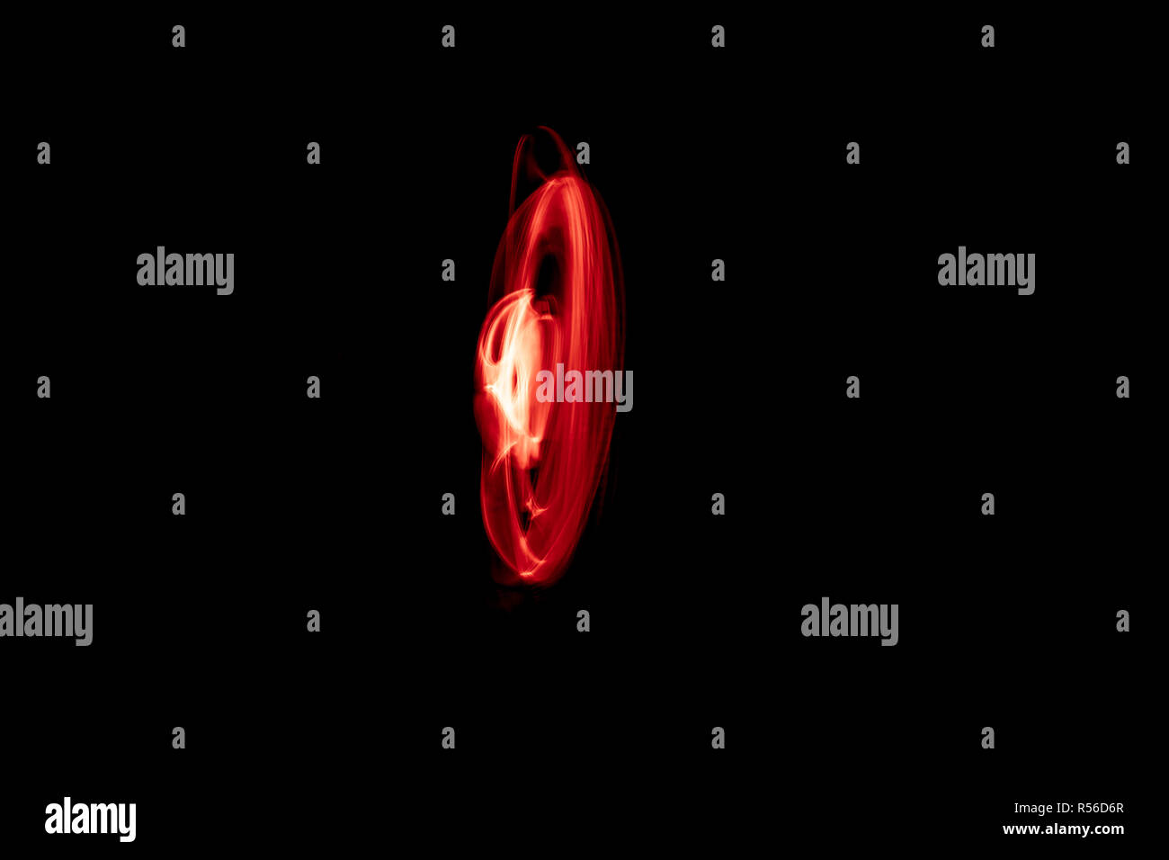 Glowing abstract curved red lines Stock Photo - Alamy