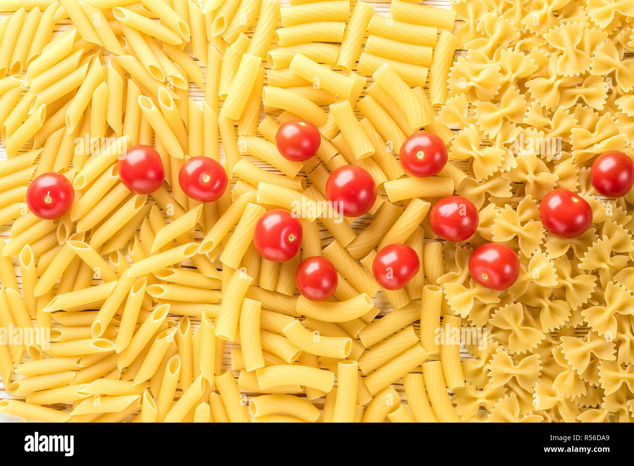 Types of Italian pasta penne rigatoni farfalle. Concept food background ...
