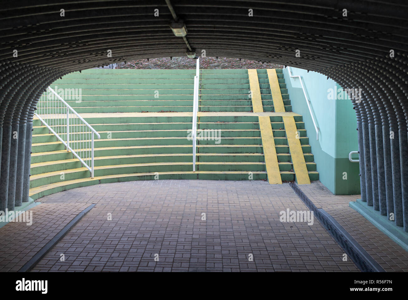 Underpass under a busy road. A place for pedestrians in the tunnel ...