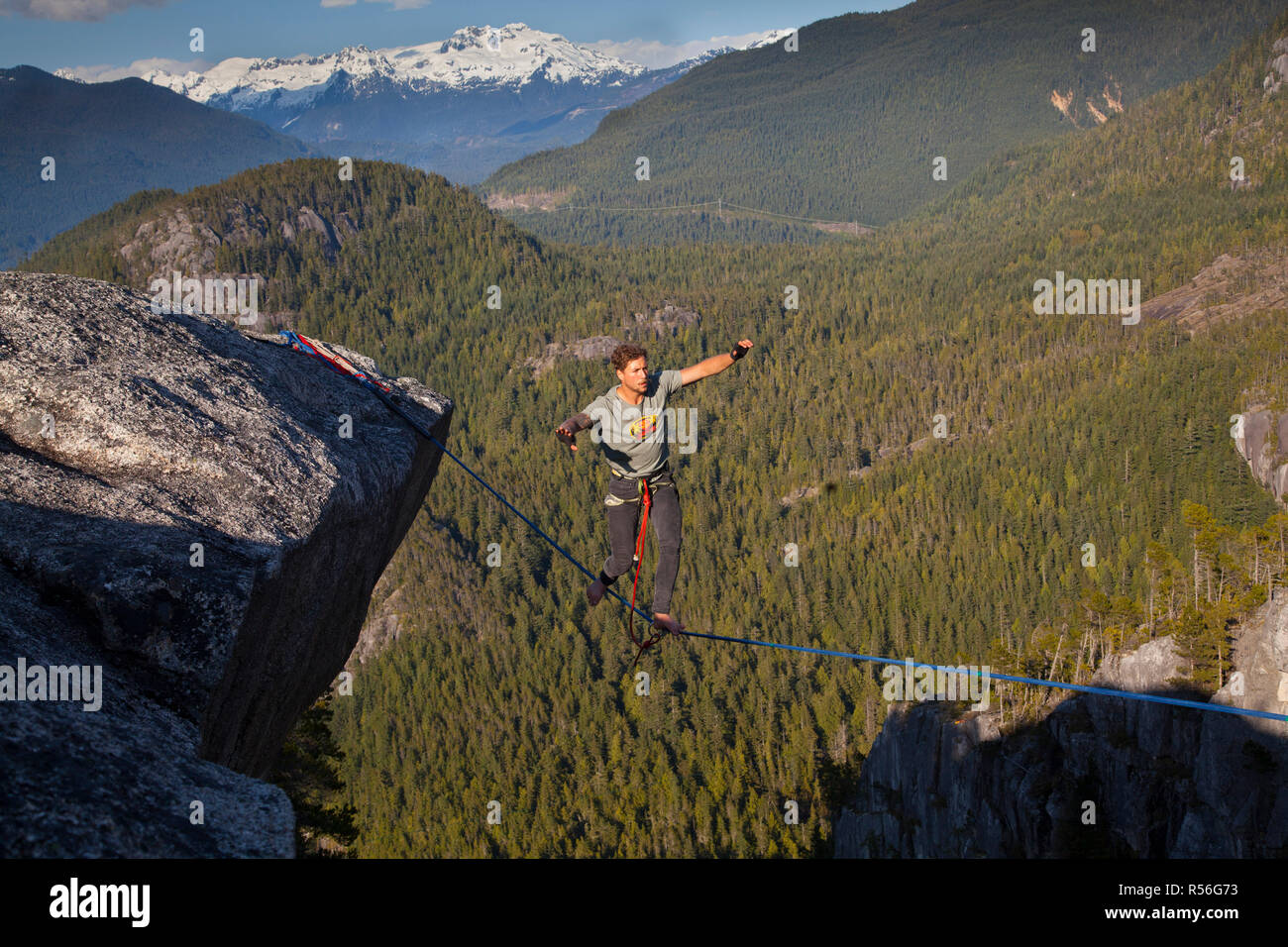 Slack high line in the mountains in Squamish, BC Stock Photo - Alamy