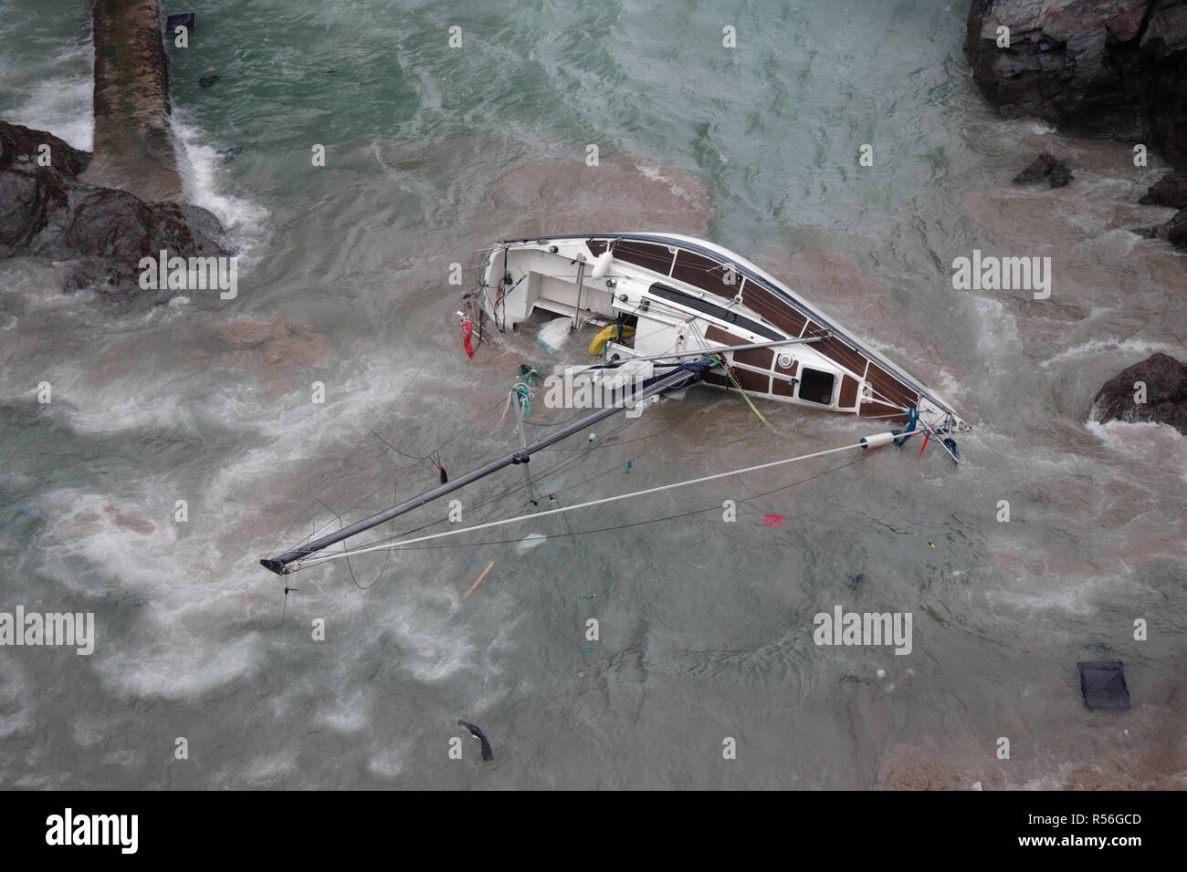 Shipwrecked yacht smashed on the Island beach Newquay,Cornwall, UK ...