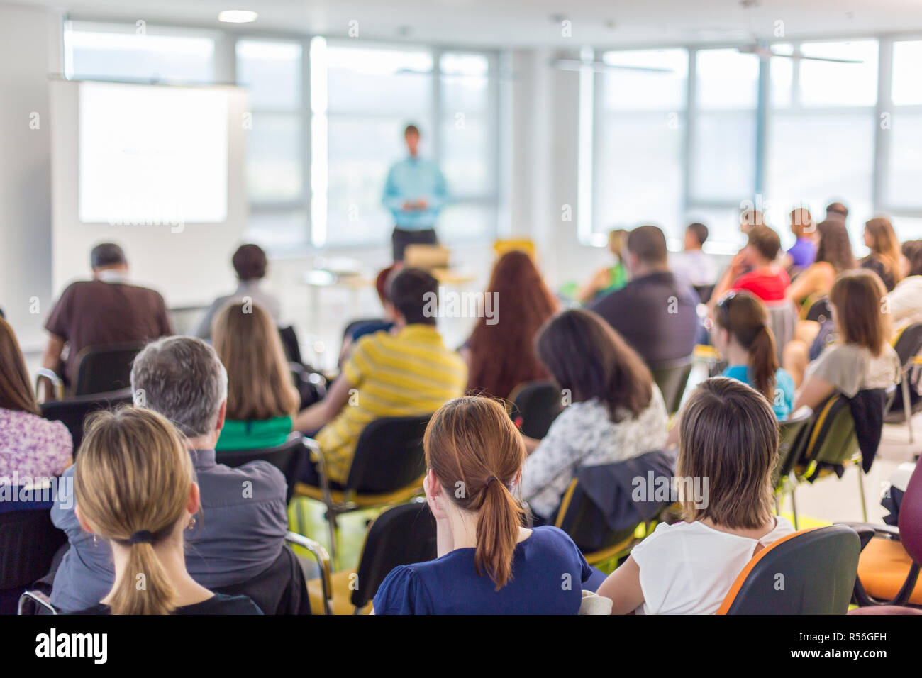 Speaker giving presentation on business conference Stock Photo - Alamy