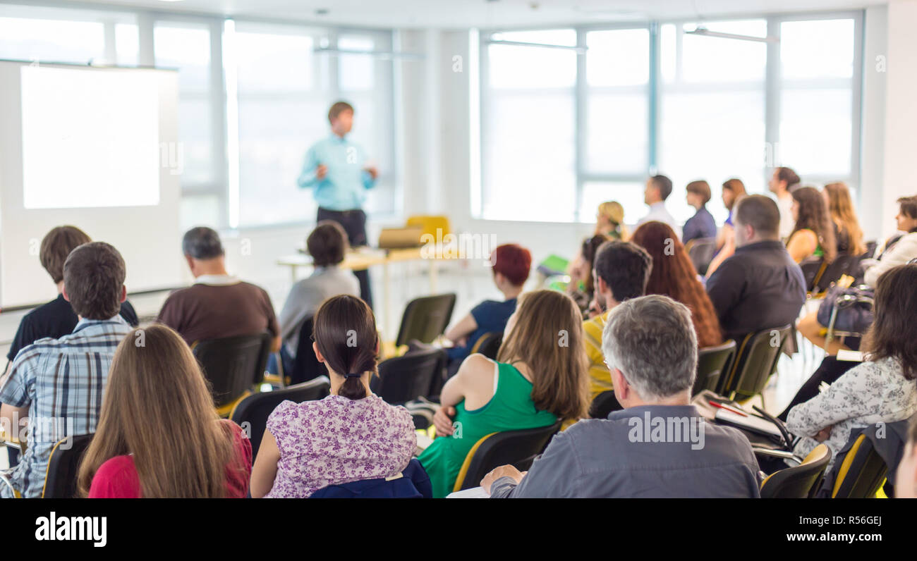 Speaker giving presentation on business conference Stock Photo - Alamy