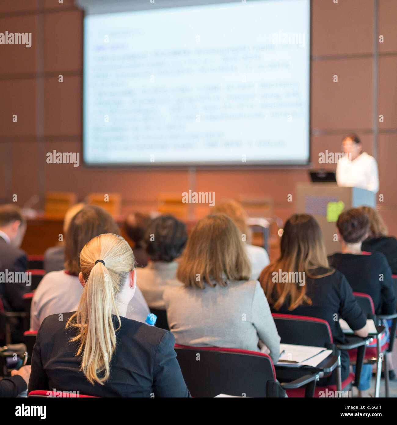 Speaker giving presentation on business conference Stock Photo - Alamy