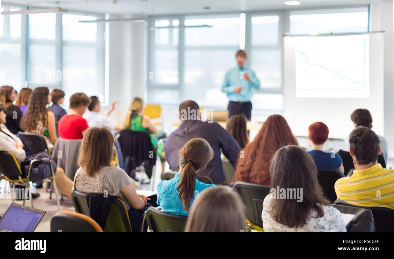 Speaker giving presentation on business conference Stock Photo - Alamy