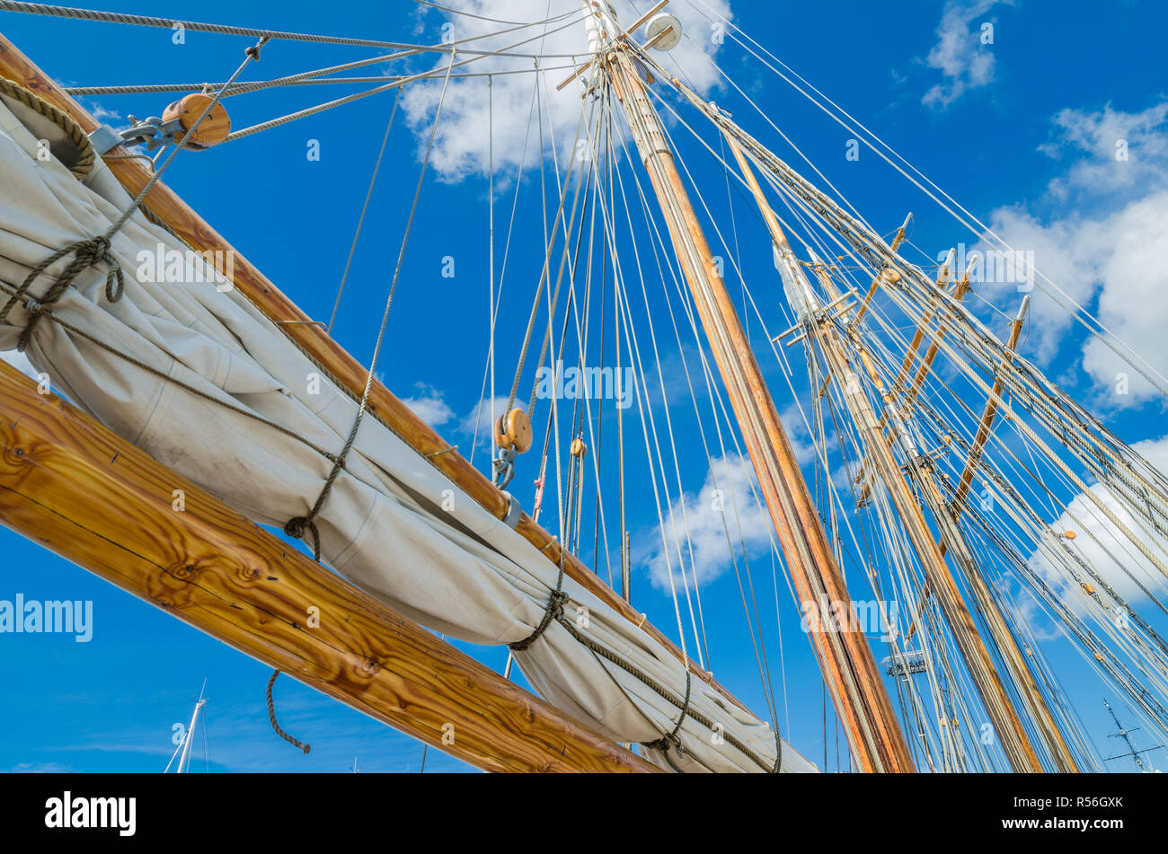 Folded sail and mast on an old sailboat Stock Photo - Alamy